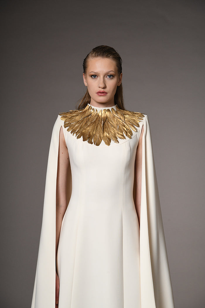 Ivory white cape dress with gold feathers