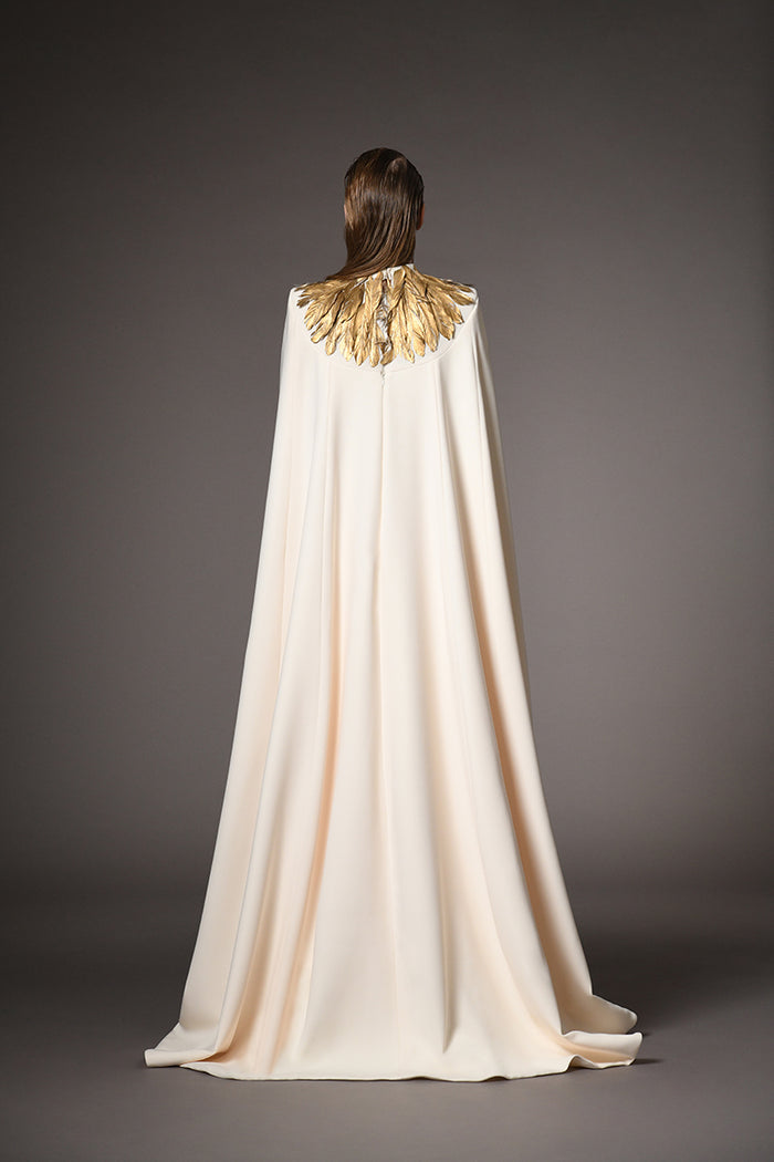 Ivory white cape dress with gold feathers